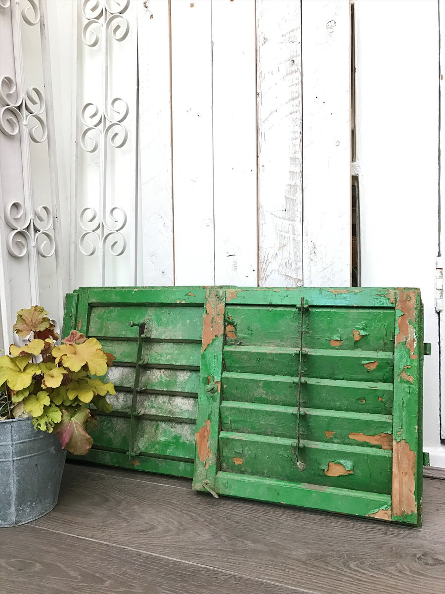 Pair of small reclaimed green shutters – Reclectic